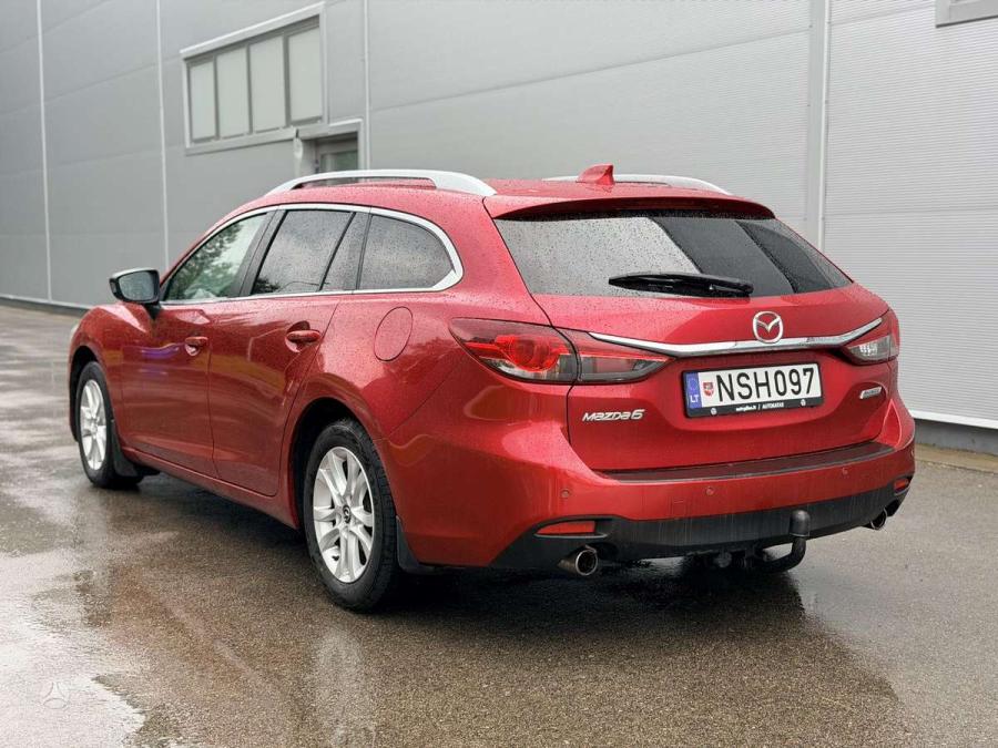 Red Mazda 6 2014 in Utena, with an engine capacity of 2.18 L and mileage of 277 thousand km for 5490 €, photo 15 on AUTOMOTO.COM.LV