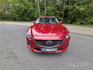 Sarkans Mazda 6 2014 Rīga, ar dzinēja tilpumu 2.20 L un nobraukumu 256 tūkst. km par 6900 €, foto  vietnē AUTOMOTO.COM.LV