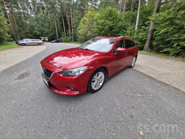 Red Mazda 6 2014 in Riga, with an engine capacity of 2.20 L and mileage of 256 thousand km for 6900 €, photo 4 on AUTOMOTO.COM.LV