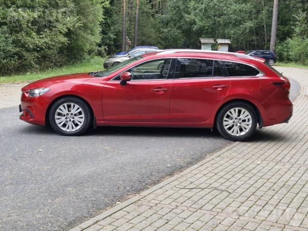 Red Mazda 6 2014 in Riga, with an engine capacity of 2.20 L and mileage of 256 thousand km for 6900 €, photo 6 on AUTOMOTO.COM.LV