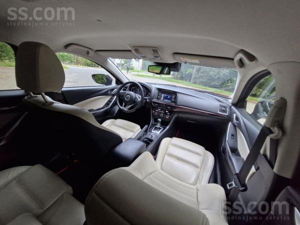 Red Mazda 6 2014 in Riga, with an engine capacity of 2.20 L and mileage of 256 thousand km for 6900 €, photo 11 on AUTOMOTO.COM.LV
