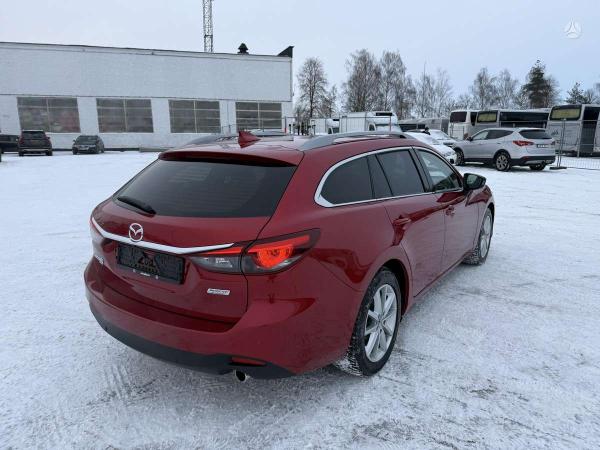 Red Mazda 6 2015 in Marijampole, with an engine capacity of 2.19 L and mileage of 192 thousand km for 7900 €, photo 6 on AUTOMOTO.COM.LV