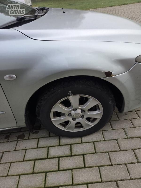 Mazda 6 2007 in Ukmerge, with an engine capacity of 2.00 L and mileage of 140 thousand km for 700 €, photo 9 on AUTOMOTO.COM.LV