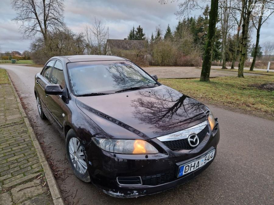 Violet Mazda 6 2008 in Ukmerge, with an engine capacity of 1.80 L and mileage of 178 thousand km for 500 €, photo 8 on AUTOMOTO.COM.LV