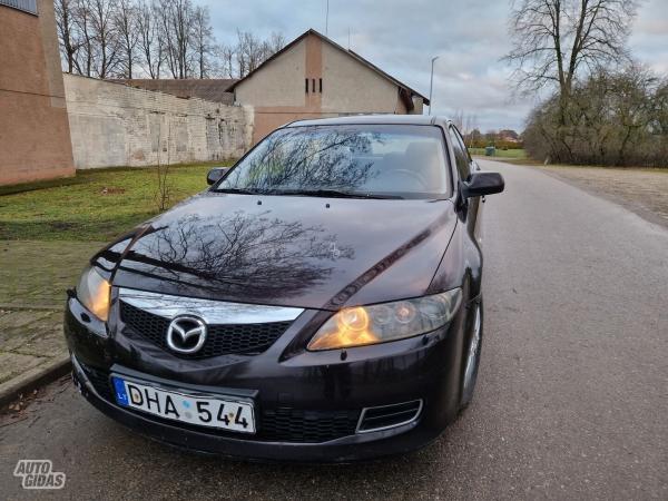 Violet Mazda 6 2008 in Ukmerge, with an engine capacity of 1.80 L and mileage of 178 thousand km for 500 €, photo 9 on AUTOMOTO.COM.LV