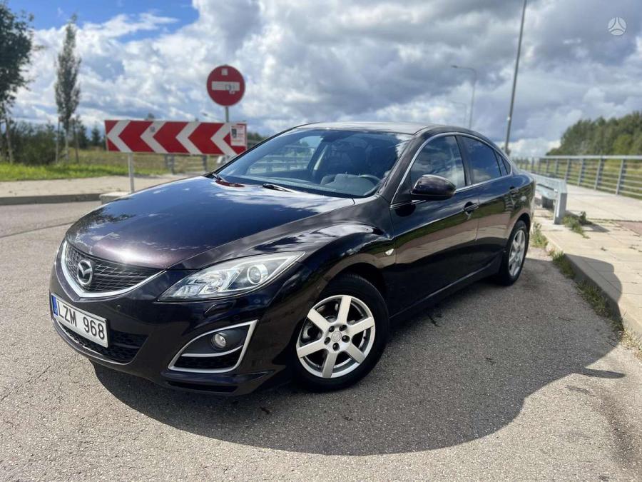 Violet Mazda 6 2009 in Vilnius, with an engine capacity of 1.99 L and mileage of 323 thousand km for 3000 €, photo 1 on AUTOMOTO.COM.LV