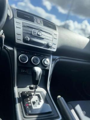 Violet Mazda 6 2009 in Vilnius, with an engine capacity of 1.99 L and mileage of 323 thousand km for 3000 €, photo 12 on AUTOMOTO.COM.LV