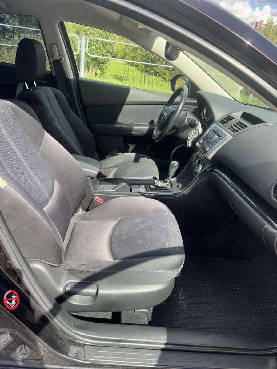Violet Mazda 6 2009 in Vilnius, with an engine capacity of 1.99 L and mileage of 323 thousand km for 3000 €, photo 15 on AUTOMOTO.COM.LV