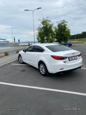 White Mazda 6 2013 in Tallinn, with an engine capacity of 2.00 L and mileage of 325 thousand km for 7999 €, photo 5 on AUTOMOTO.COM.LV