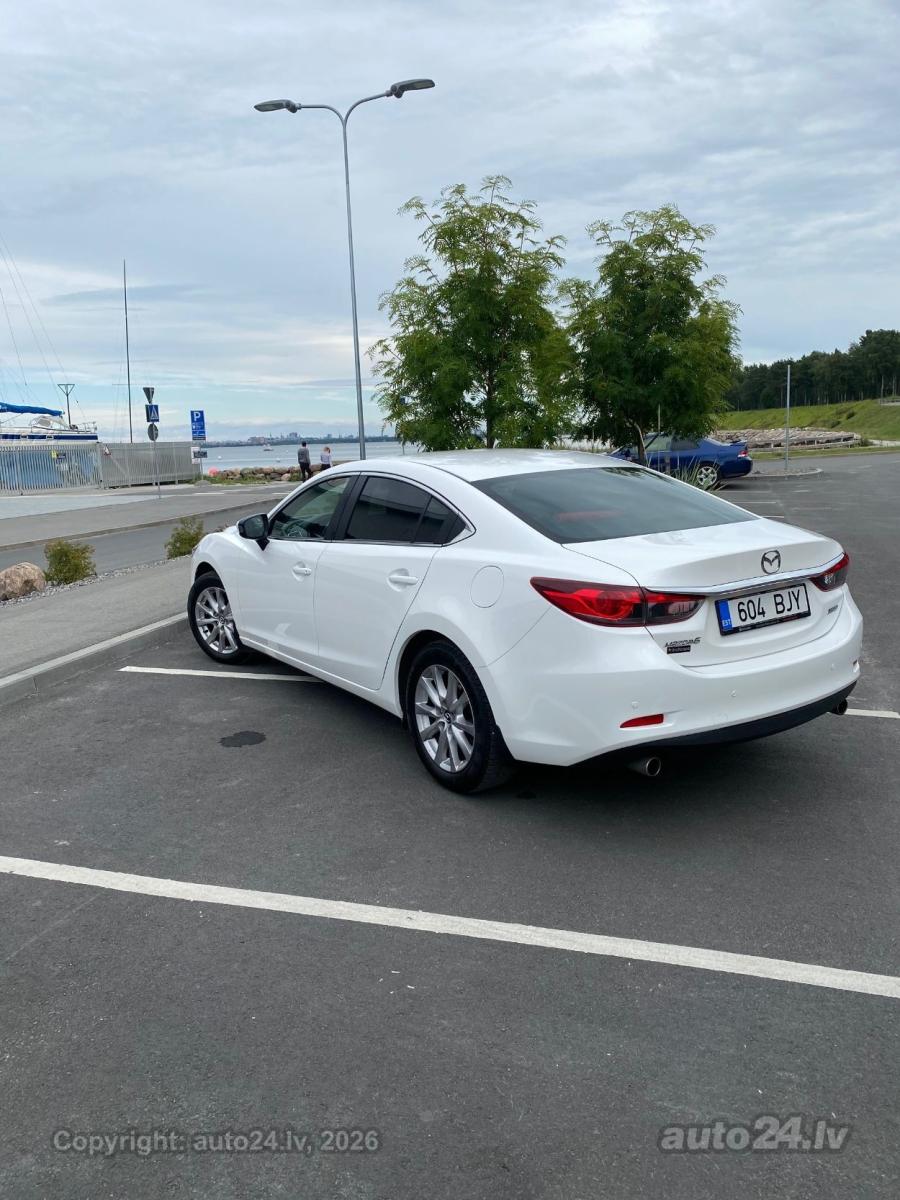 White Mazda 6 2013 in Tallinn, with an engine capacity of 2.00 L and mileage of 325 thousand km for 7999 €, photo 5 on AUTOMOTO.COM.LV