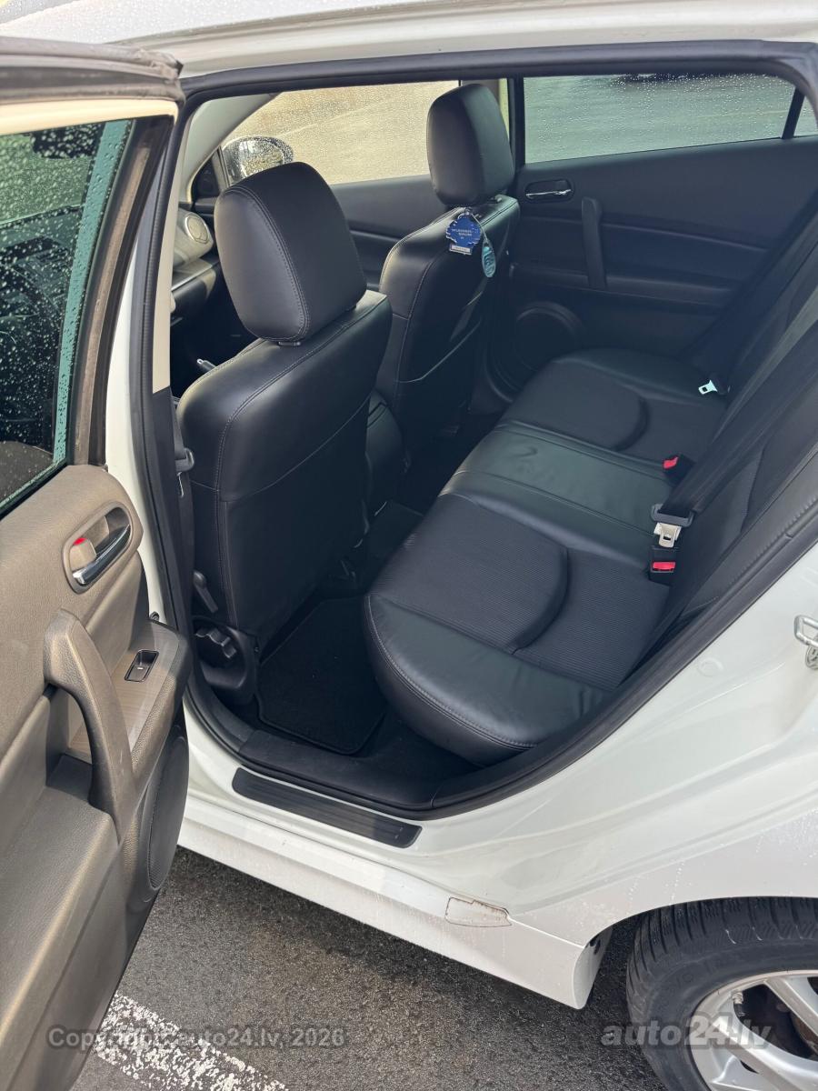 White Mazda 6 2011 in Tallinn, with an engine capacity of 2.20 L and mileage of 270 thousand km for 3900 €, photo 12 on AUTOMOTO.COM.LV