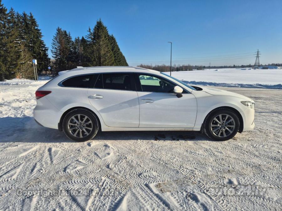 White Mazda 6 2013 in Tallinn, with an engine capacity of 2.00 L and mileage of 276 thousand km for 8300 €, photo 5 on AUTOMOTO.COM.LV