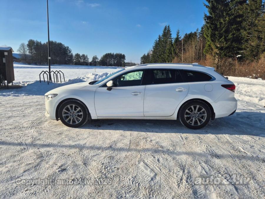 White Mazda 6 2013 in Tallinn, with an engine capacity of 2.00 L and mileage of 276 thousand km for 8300 €, photo 6 on AUTOMOTO.COM.LV
