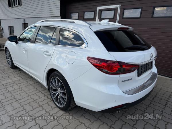White Mazda 6 2013 in Voru, with an engine capacity of 2.20 L and mileage of 261 thousand km for 6390 €, photo 4 on AUTOMOTO.COM.LV