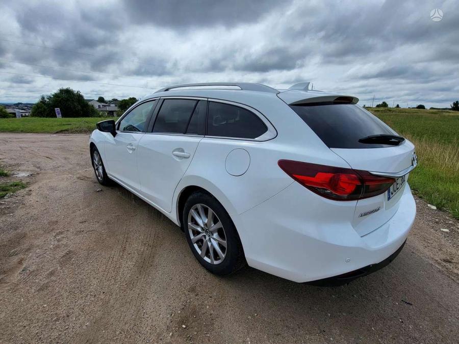 White Mazda 6 2013 in Klaipeda, with an engine capacity of 2.19 L and mileage of 288 thousand km for 4200 €, photo 5 on AUTOMOTO.COM.LV
