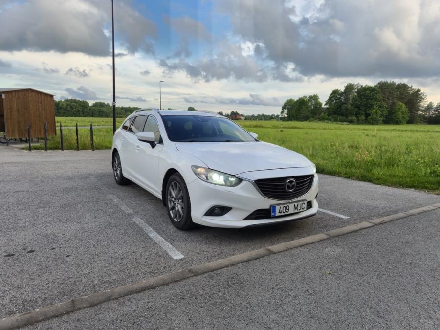 White Mazda 6 2013 in Keila, with an engine capacity of 2.00 L and mileage of 282 thousand km for 6900 €, photo 16 on AUTOMOTO.COM.LV
