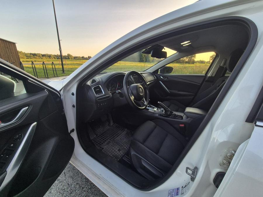 White Mazda 6 2013 in Keila, with an engine capacity of 2.00 L and mileage of 282 thousand km for 6900 €, photo 18 on AUTOMOTO.COM.LV