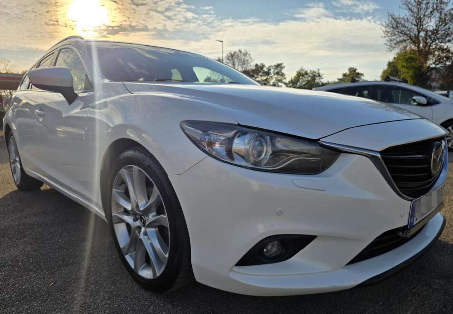 White Mazda 6 2013 in Marijampole, with an engine capacity of 2.18 L and mileage of 283 thousand km for 5200 €, photo 5 on AUTOMOTO.COM.LV