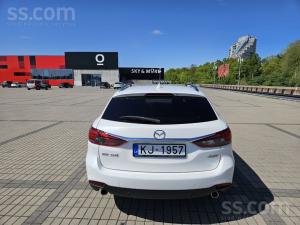 White Mazda 6 2016 in Riga, with an engine capacity of 2.00 L and mileage of 153 thousand km for 14300 €, photo 12 on AUTOMOTO.COM.LV