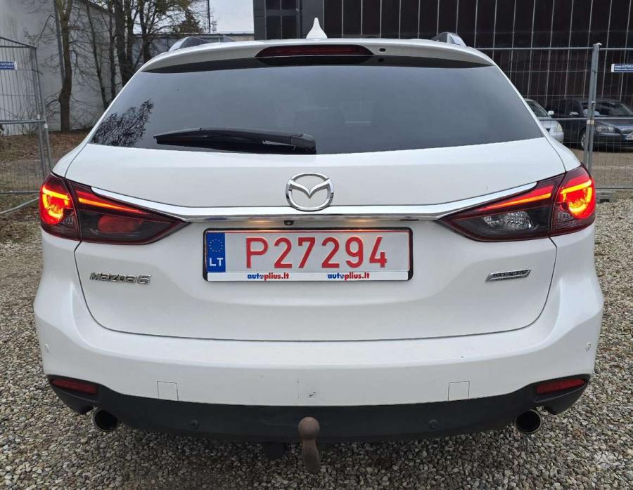 White Mazda 6 2016 in Kaunas, with an engine capacity of 2.19 L and mileage of 304 thousand km for 6990 €, photo 6 on AUTOMOTO.COM.LV