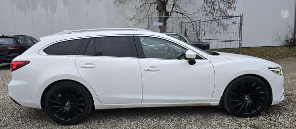 White Mazda 6 2016 in Kaunas, with an engine capacity of 2.19 L and mileage of 304 thousand km for 6990 €, photo 4 on AUTOMOTO.COM.LV
