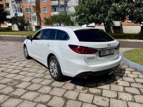 White Mazda 6 2016 in Liepaja, with an engine capacity of 2.20 L and mileage of 220 thousand km for 6990 €, photo 4 on AUTOMOTO.COM.LV