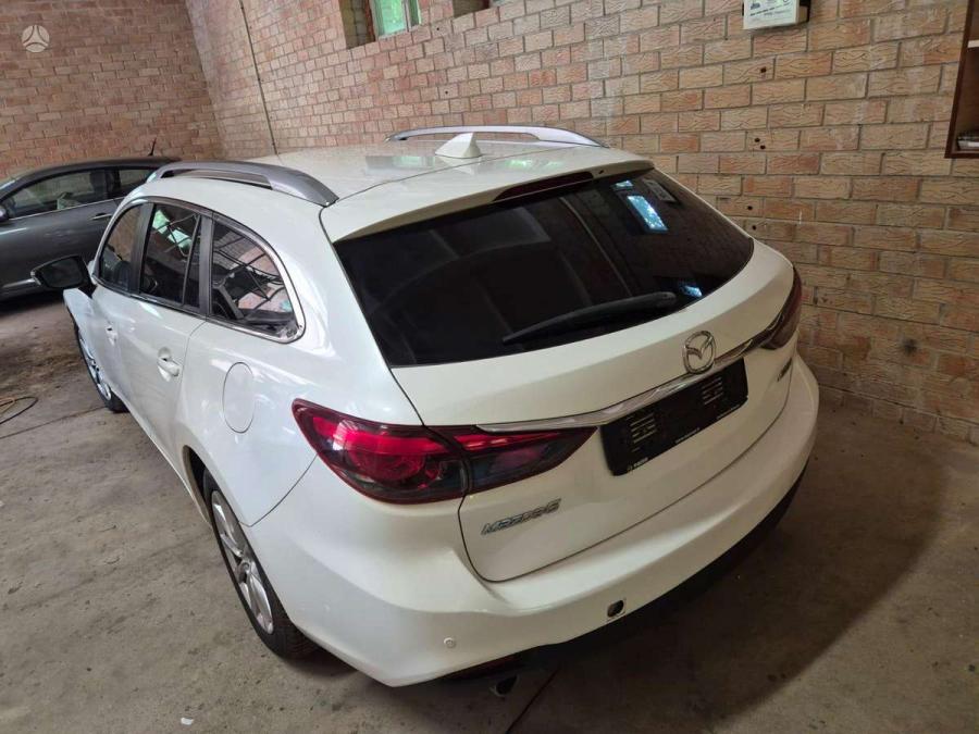 White Mazda 6 2016 in Panevezys, with an engine capacity of 2.18 L and mileage of 260 thousand km for 3700 €, photo 16 on AUTOMOTO.COM.LV