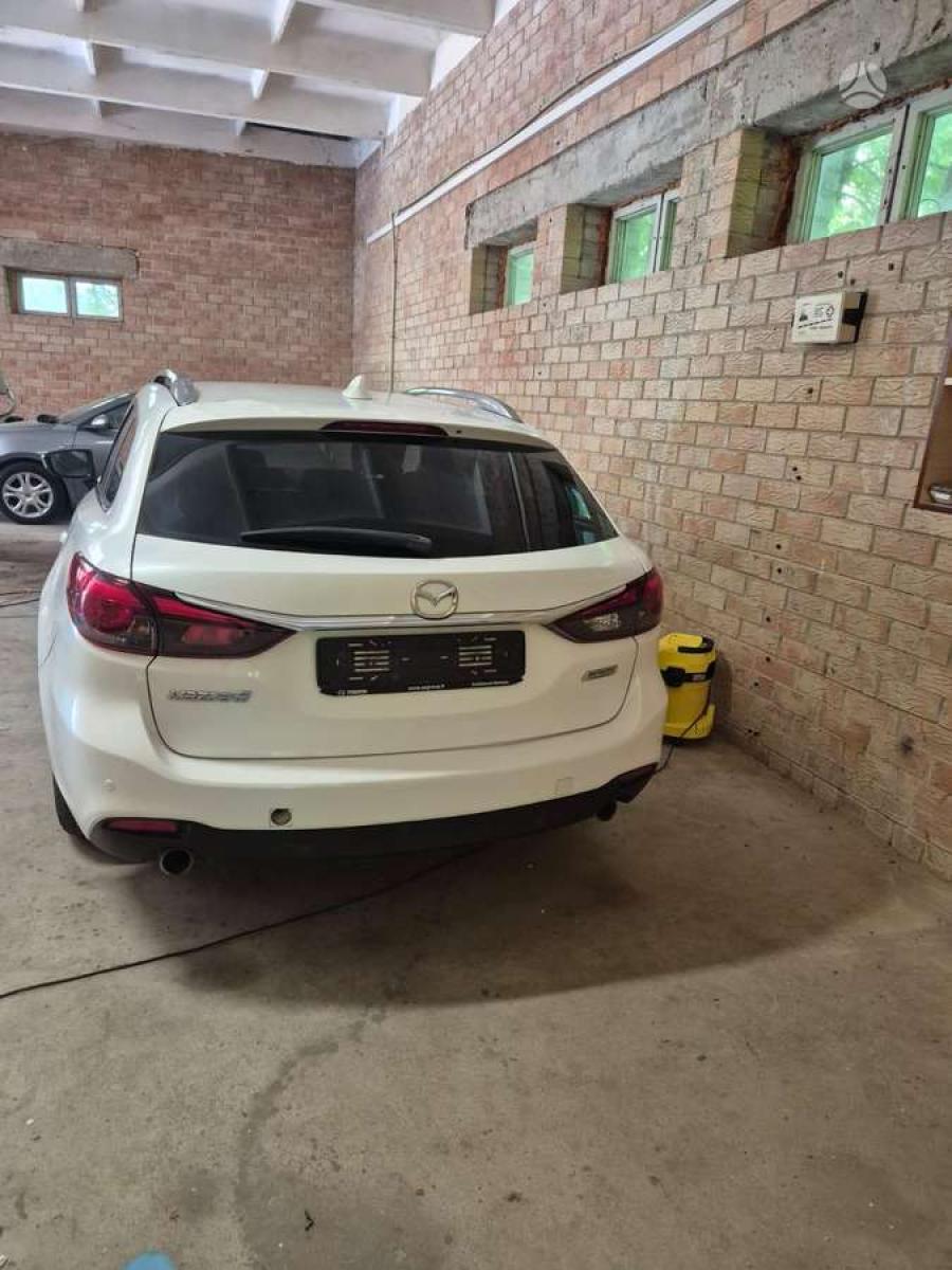 White Mazda 6 2016 in Panevezys, with an engine capacity of 2.18 L and mileage of 260 thousand km for 3700 €, photo 17 on AUTOMOTO.COM.LV
