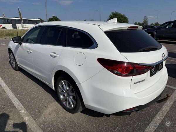 White Mazda 6 2017 in Vilnius, with an engine capacity of 2.19 L and mileage of 305 thousand km for 2150 €, photo 4 on AUTOMOTO.COM.LV