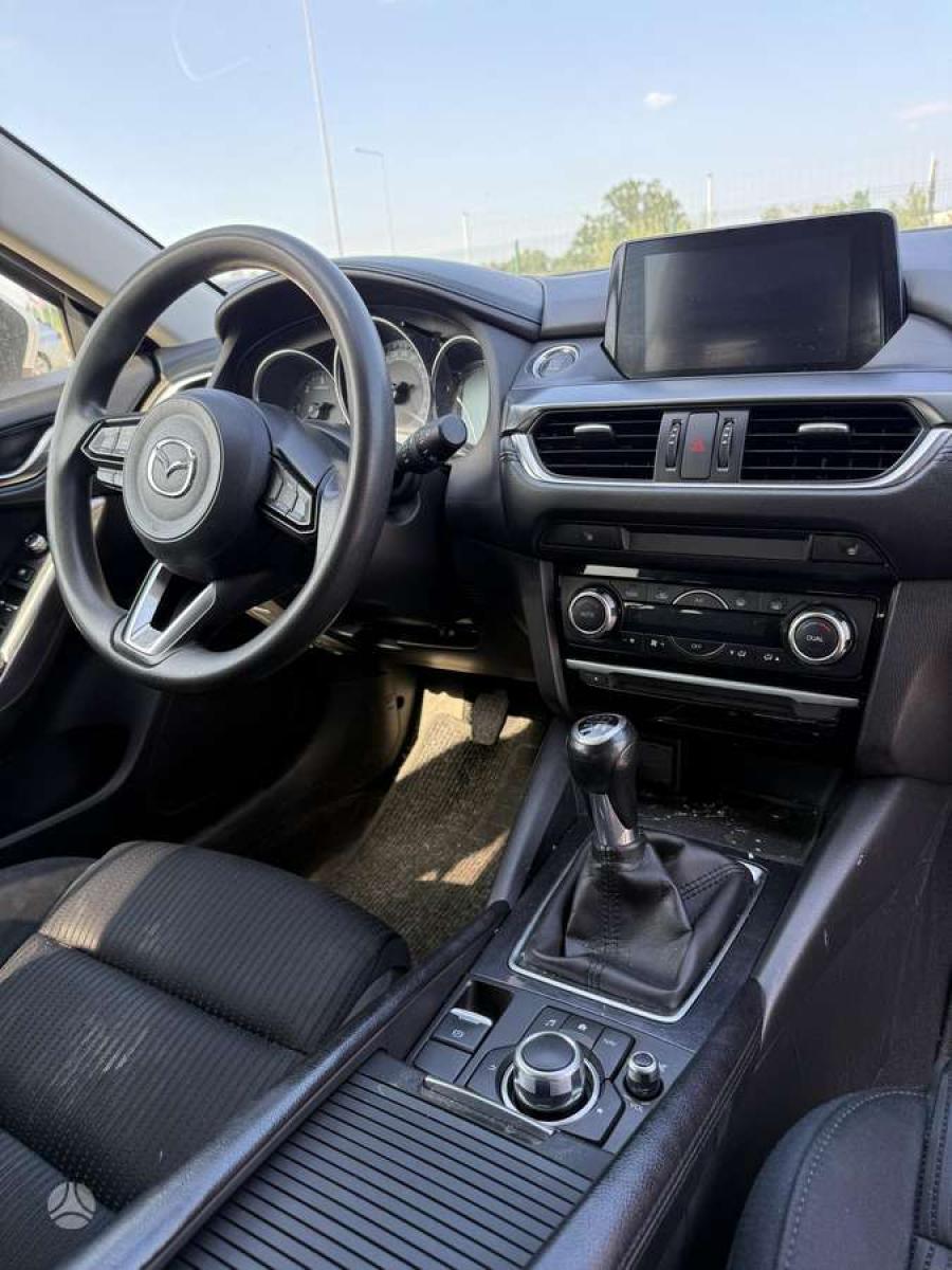 White Mazda 6 2017 in Vilnius, with an engine capacity of 2.19 L and mileage of 305 thousand km for 2150 €, photo 11 on AUTOMOTO.COM.LV