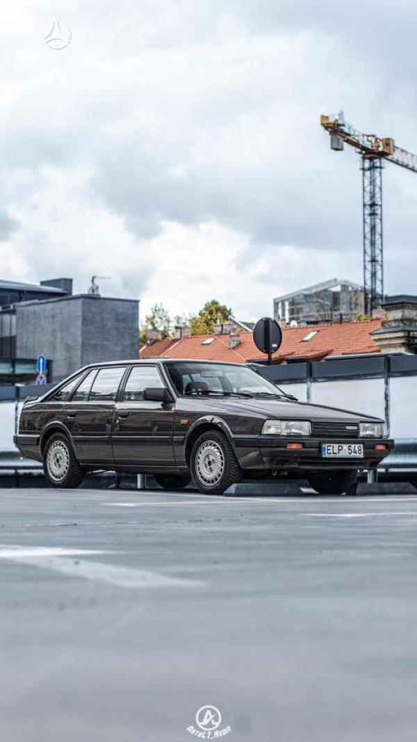 Melns Mazda 626 1986 Viļņa, ar dzinēja tilpumu 1.98 L un nobraukumu 221 tūkst. km par 2100 €, foto 1 vietnē AUTOMOTO.COM.LV
