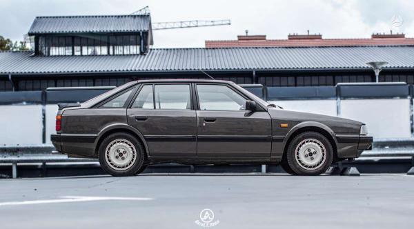 Melns Mazda 626 1986 Viļņa, ar dzinēja tilpumu 1.98 L un nobraukumu 221 tūkst. km par 2100 €, foto 3 vietnē AUTOMOTO.COM.LV