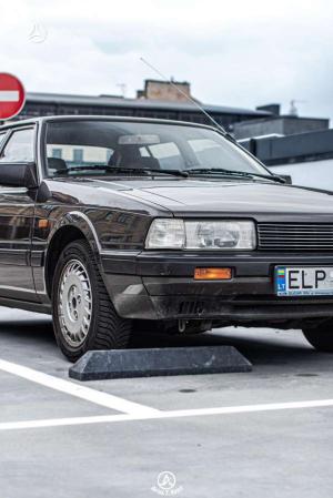 Melns Mazda 626 1986 Viļņa, ar dzinēja tilpumu 1.98 L un nobraukumu 221 tūkst. km par 2100 €, foto 13 vietnē AUTOMOTO.COM.LV