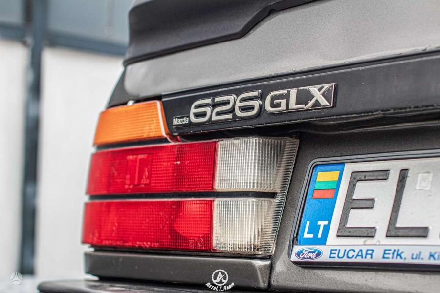 Melns Mazda 626 1986 Viļņa, ar dzinēja tilpumu 1.98 L un nobraukumu 221 tūkst. km par 2100 €, foto 19 vietnē AUTOMOTO.COM.LV