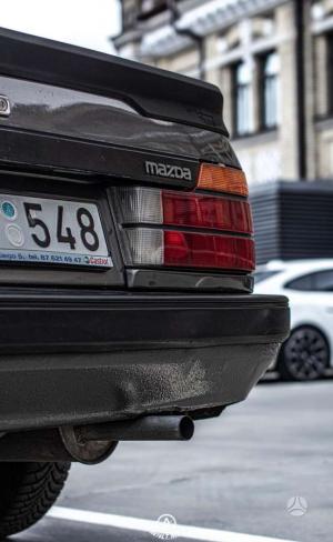 Melns Mazda 626 1986 Viļņa, ar dzinēja tilpumu 1.98 L un nobraukumu 221 tūkst. km par 2100 €, foto 21 vietnē AUTOMOTO.COM.LV