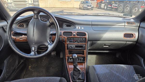 Blue Mazda 626 1994 in Marijampole, with an engine capacity of 2.00 L and mileage of 260 thousand km for 999 €, photo 4 on AUTOMOTO.COM.LV