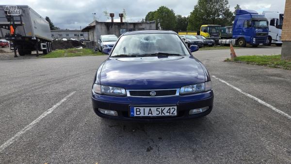 Blue Mazda 626 1994 in Marijampole, with an engine capacity of 2.00 L and mileage of 260 thousand km for 999 €, photo 5 on AUTOMOTO.COM.LV