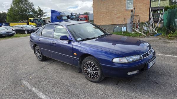 Blue Mazda 626 1994 in Marijampole, with an engine capacity of 2.00 L and mileage of 260 thousand km for 999 €, photo 8 on AUTOMOTO.COM.LV