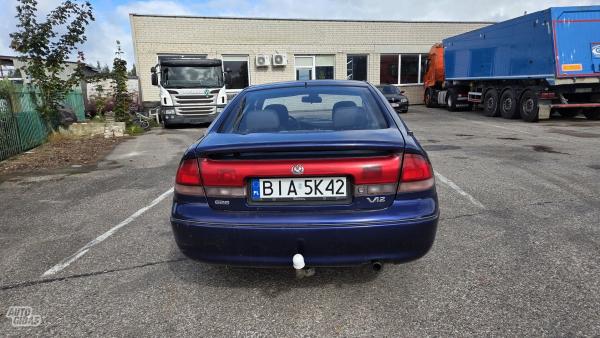 Blue Mazda 626 1994 in Marijampole, with an engine capacity of 2.00 L and mileage of 260 thousand km for 999 €, photo 11 on AUTOMOTO.COM.LV