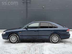 Zils Mazda 626 1999 Rīga, ar dzinēja tilpumu 1.80 L un nobraukumu 217 tūkst. km par 1699 €, foto 2 vietnē AUTOMOTO.COM.LV
