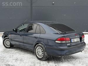 Zils Mazda 626 1999 Rīga, ar dzinēja tilpumu 1.80 L un nobraukumu 217 tūkst. km par 1699 €, foto 3 vietnē AUTOMOTO.COM.LV