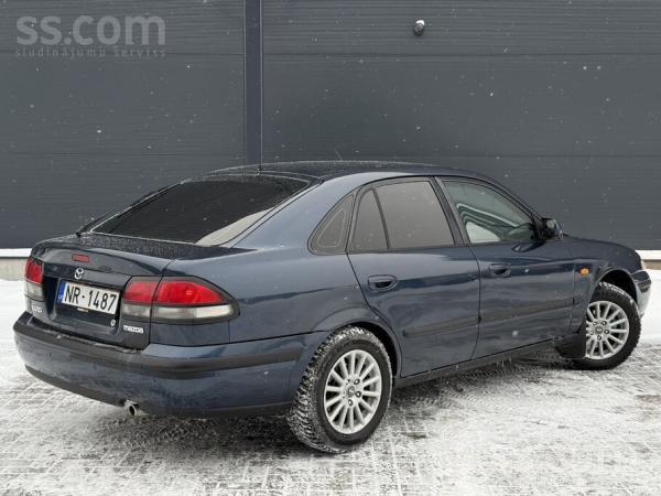 Blue Mazda 626 1999 in Riga, with an engine capacity of 1.80 L and mileage of 217 thousand km for 1699 €, photo 5 on AUTOMOTO.COM.LV