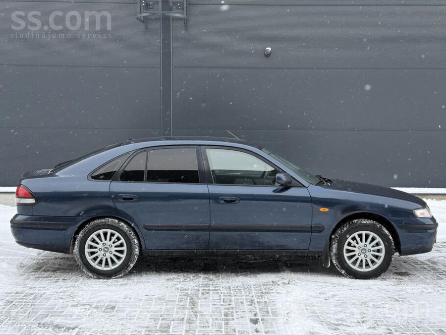 Zils Mazda 626 1999 Rīga, ar dzinēja tilpumu 1.80 L un nobraukumu 217 tūkst. km par 1699 €, foto 6 vietnē AUTOMOTO.COM.LV