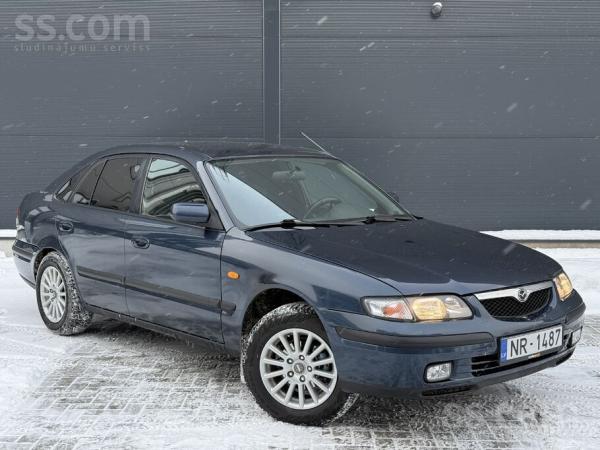 Blue Mazda 626 1999 in Riga, with an engine capacity of 1.80 L and mileage of 217 thousand km for 1699 €, photo 7 on AUTOMOTO.COM.LV
