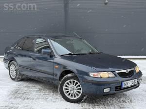 Zils Mazda 626 1999 Rīga, ar dzinēja tilpumu 1.80 L un nobraukumu 217 tūkst. km par 1699 €, foto 7 vietnē AUTOMOTO.COM.LV
