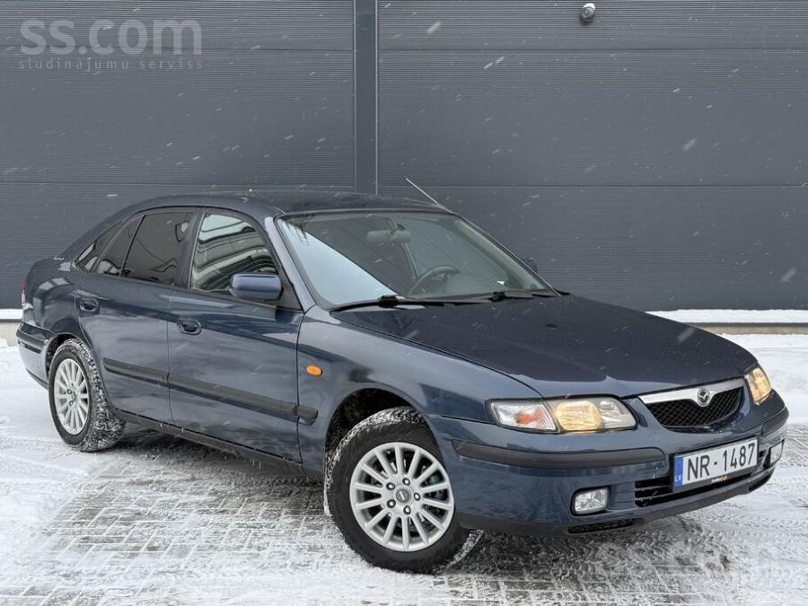 Zils Mazda 626 1999 Rīga, ar dzinēja tilpumu 1.80 L un nobraukumu 217 tūkst. km par 1699 €, foto 7 vietnē AUTOMOTO.COM.LV