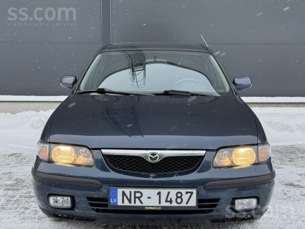 Blue Mazda 626 1999 in Riga, with an engine capacity of 1.80 L and mileage of 217 thousand km for 1699 €, photo 8 on AUTOMOTO.COM.LV