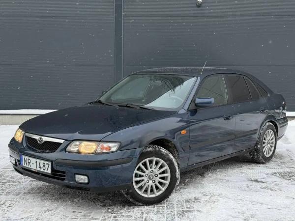 Blue Mazda 626 1999 in Riga, with an engine capacity of 1.80 L and mileage of 217 thousand km for 1699 €, photo 1 on AUTOMOTO.COM.LV