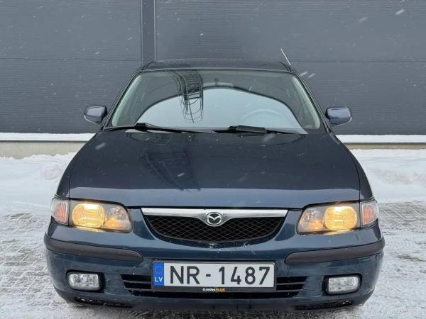 Blue Mazda 626 1999 in Riga, with an engine capacity of 1.80 L and mileage of 217 thousand km for 1699 €, photo 8 on AUTOMOTO.COM.LV