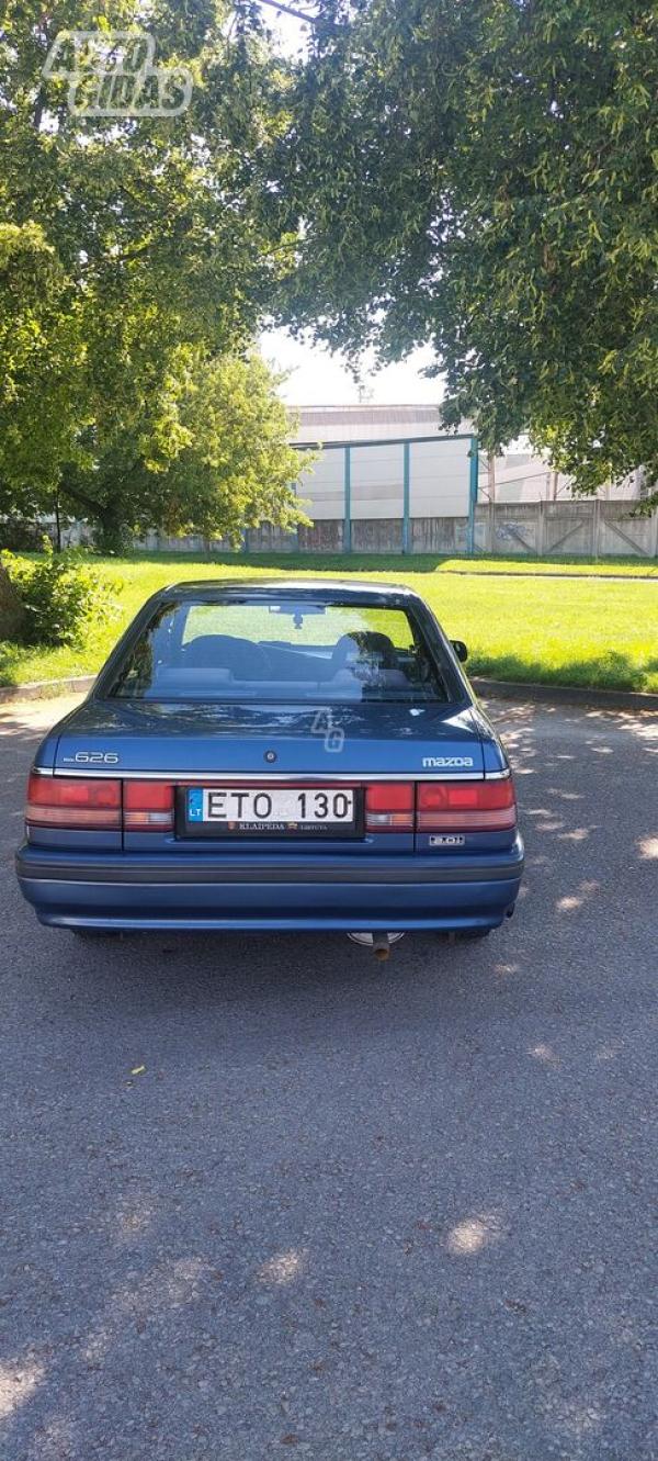 Blue Mazda 626 1988 in Klaipeda, with an engine capacity of 2.00 L and mileage of 224 thousand km for 1000 €, photo 6 on AUTOMOTO.COM.LV